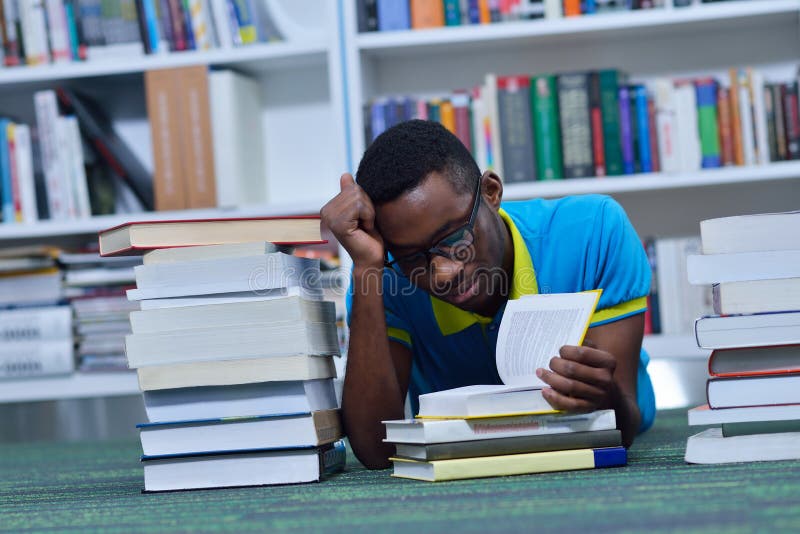 Student Reading Book in Library Study Lessons for Exam. Stock Photo ...
