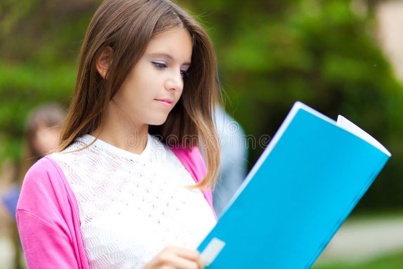 Student Reading a Book at the Park Stock Photo - Image of cheerful ...