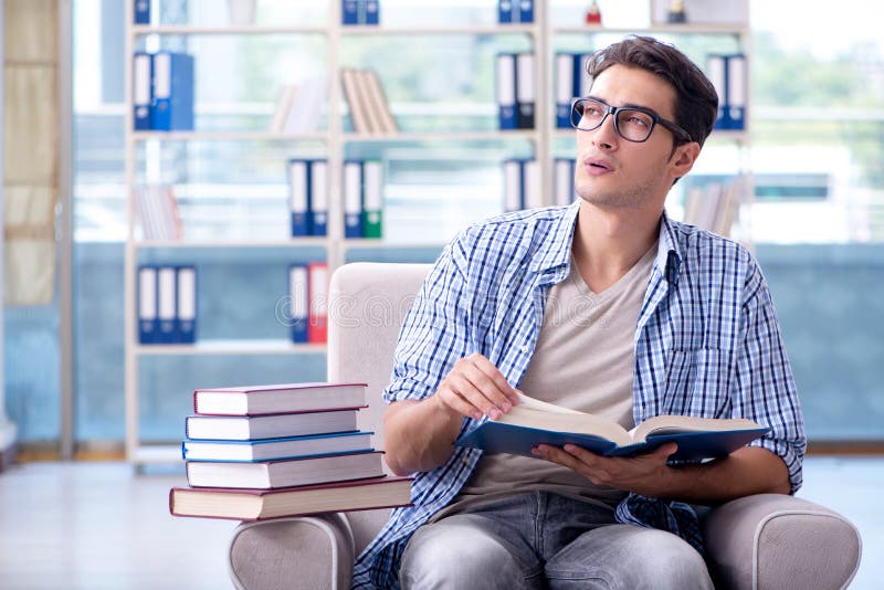 The Student Reading Books and Preparing for Exams in Library Stock ...