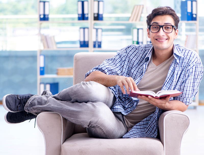 Student Reading Books and Preparing for Exams in Library Stock Photo ...
