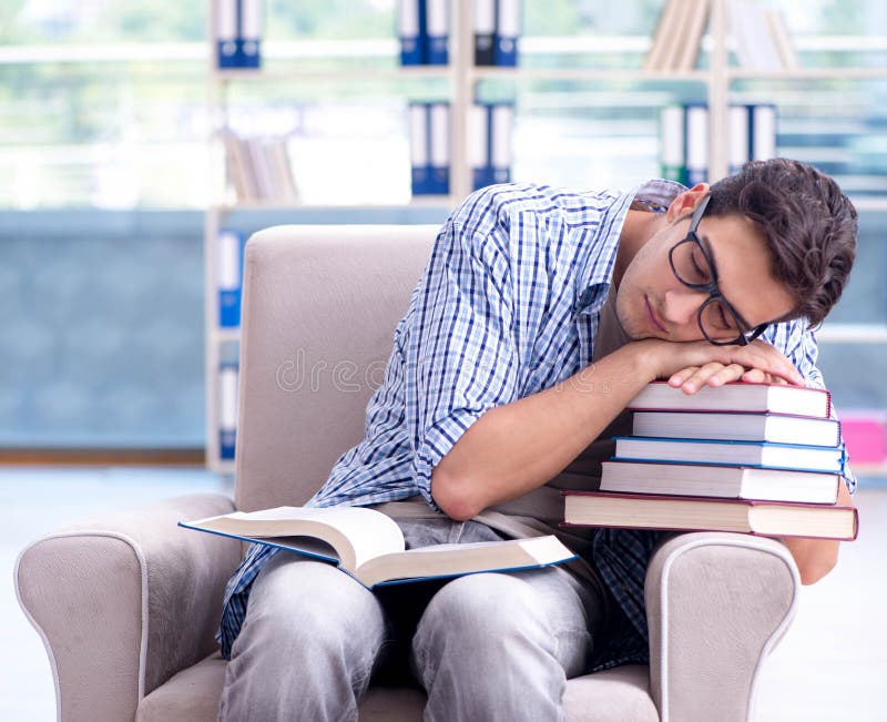 Student Reading Books and Preparing for Exams in Library Stock Photo ...