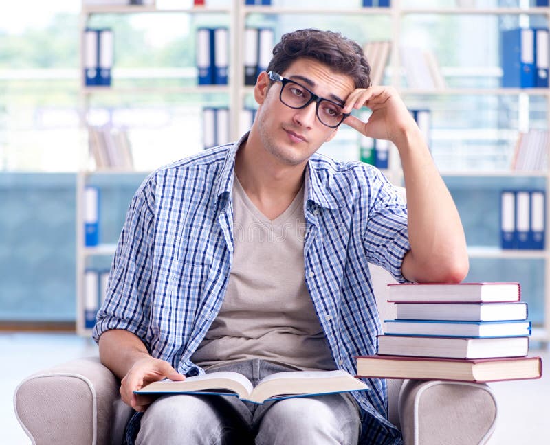 Student Reading Books and Preparing for Exams in Library Stock Photo ...