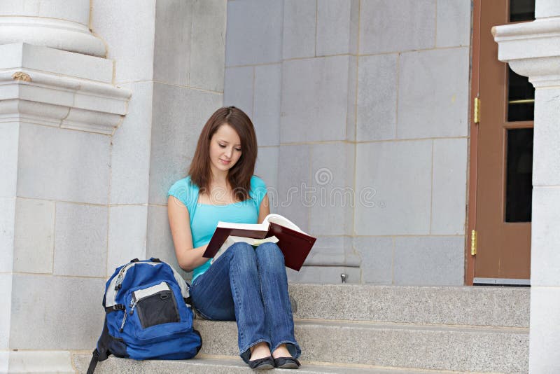 Student reading on steps stock image. Image of education - 19248477