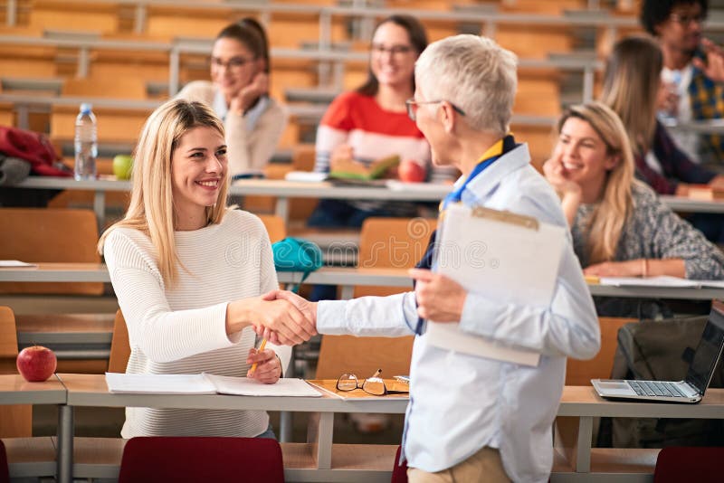 Student Receiving an Successful Exam in a Classroom Stock Image - Image ...