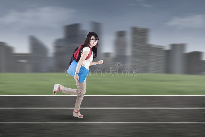 Student Running on Tracks 1 Stock Photo - Image of college, beautiful ...