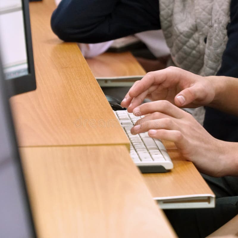 Student S Hands at the Computer Keyboard in Computer Classroom Stock ...