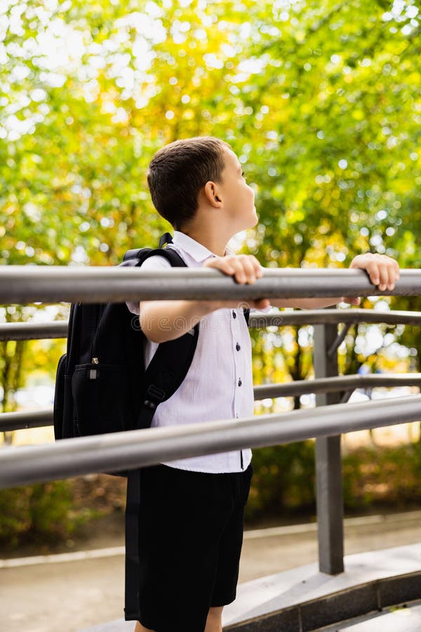 A Student School Boy on the Playground on the First Day of Class. Stock ...