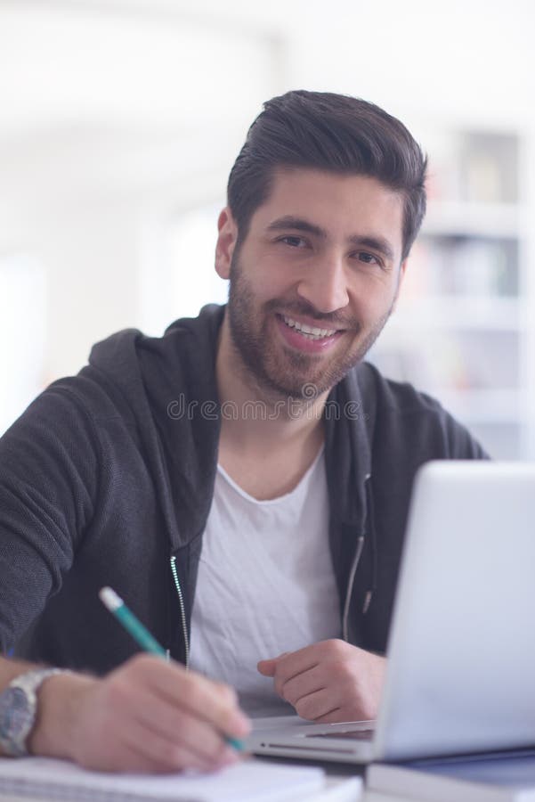Student in School Library Using Laptop for Research Stock Photo - Image ...