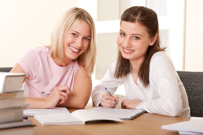 Student Series - Two Friends Studying Together Stock Image - Image of ...