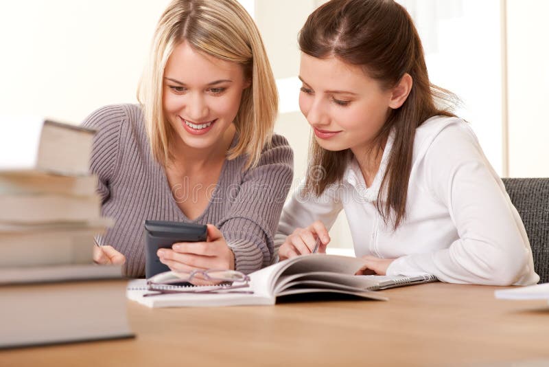 Student Series - Two Friends Writing Homework Stock Photo - Image of ...