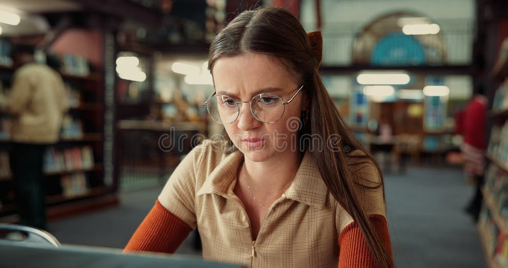 Student, Serious Woman and Computer in Library for Learning, Education ...