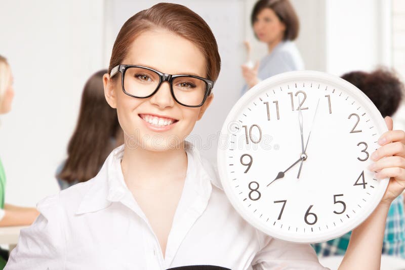 Student showing clock stock image. Image of alarm, group - 37771329