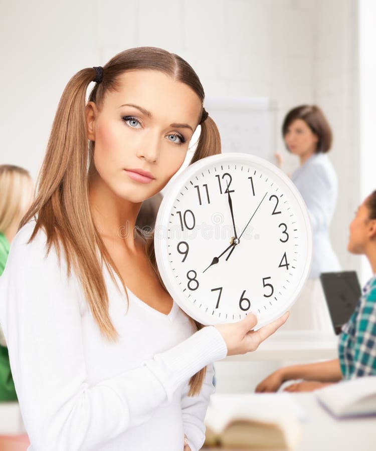 Student showing clock stock photo. Image of education - 37771376