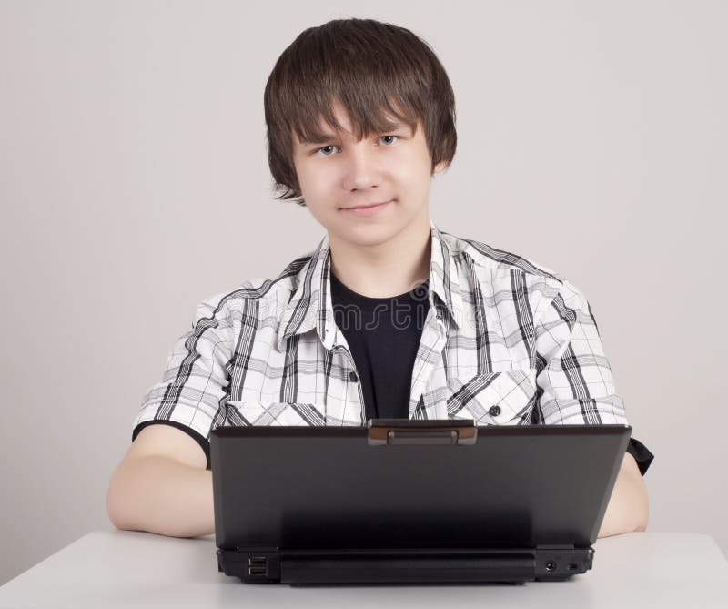 Student Sits for a Portable Computer Stock Photo - Image of long ...