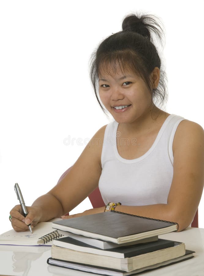 Student Sitting Down at Desk and Doing Homework Stock Image - Image of ...