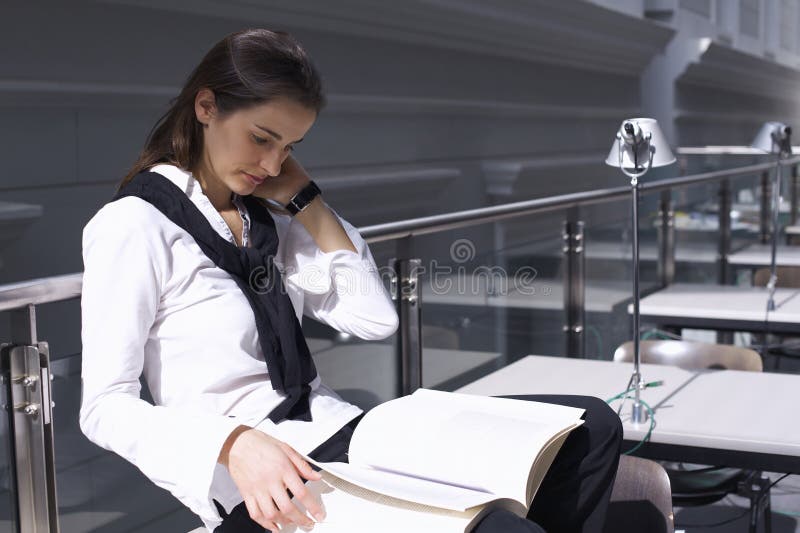 Student Sitting and Reading Stock Image - Image of literature, alone ...