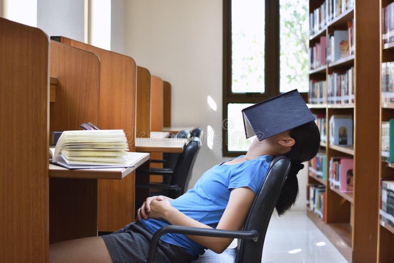 Student Sleeping with Book in the Library Stock Photo - Image of ...