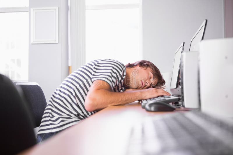 Student Sleeping on Computer in Classroom Stock Photo - Image of adult ...