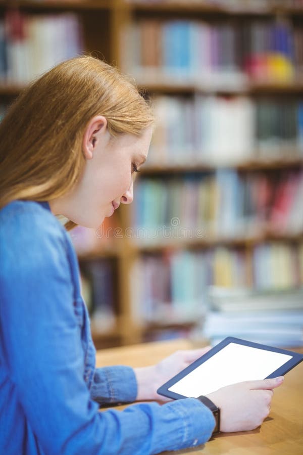 Student with Smartwatch Using Tablet in Library Stock Image - Image of ...