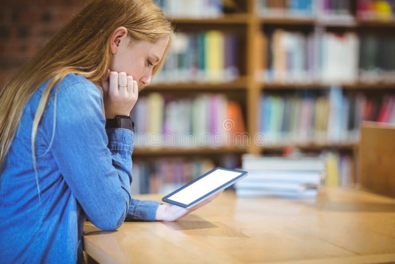 Student with Smartwatch Using Tablet in Library Stock Photo - Image of ...