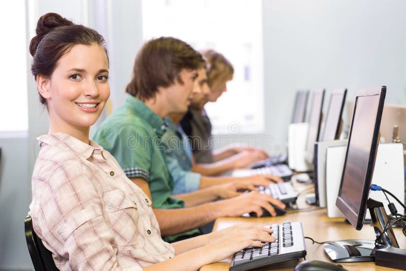 Student Smiling at Camera in Computer Class Stock Image - Image of ...