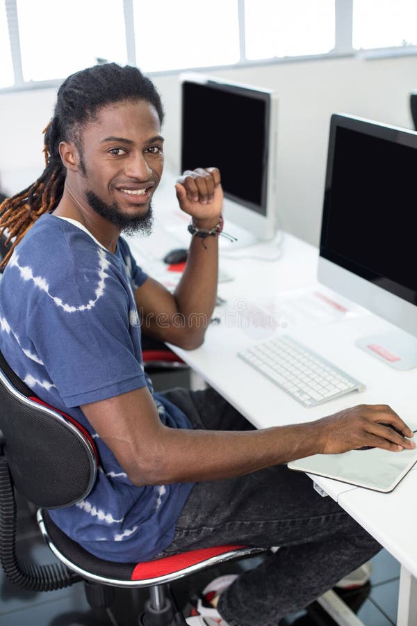 Student Smiling at Camera in Computer Class Stock Photo - Image of ...