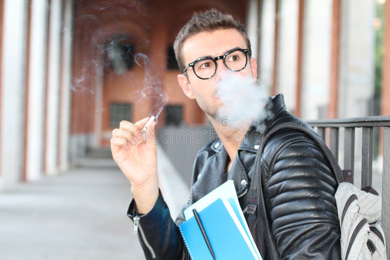 Student Smoking on Campus Close Up Stock Image - Image of meditating ...