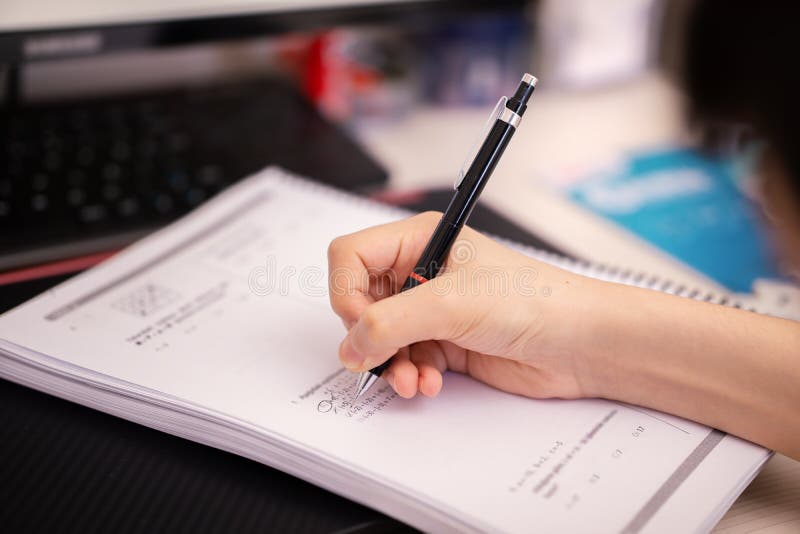 Student Solving Questions and Doing Homework at Home Stock Image ...
