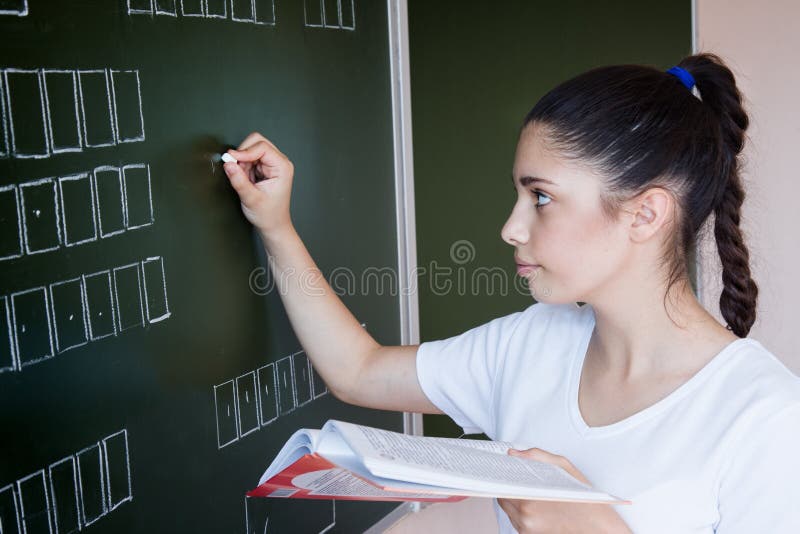 Student Stays Near Blackboard in Classroom Stock Image - Image of ...