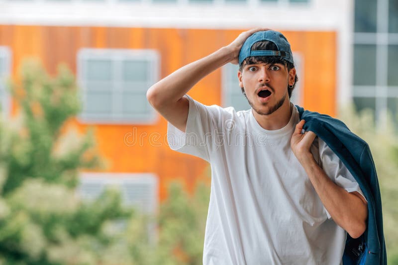 Student on the Street with Surprised Expression Stock Photo - Image of ...