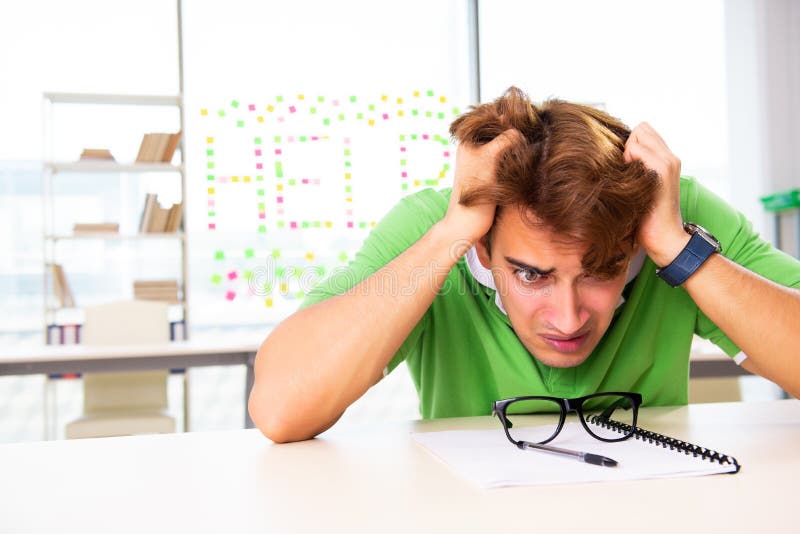 The Student Struggling at the Exam in Classroom Stock Photo - Image of ...