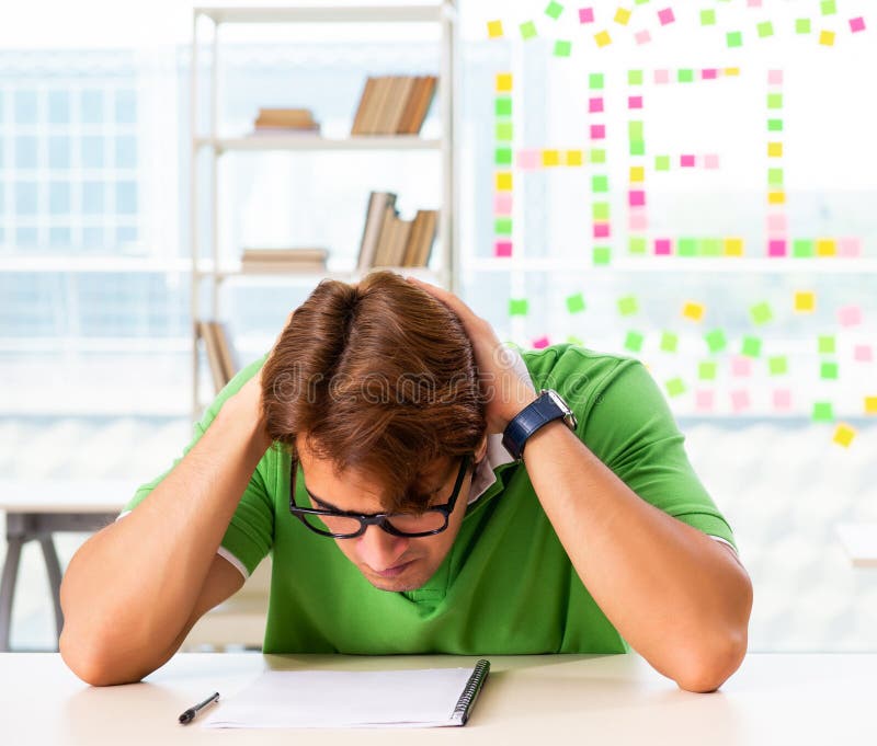 The Student Struggling at the Exam in Classroom Stock Image - Image of ...