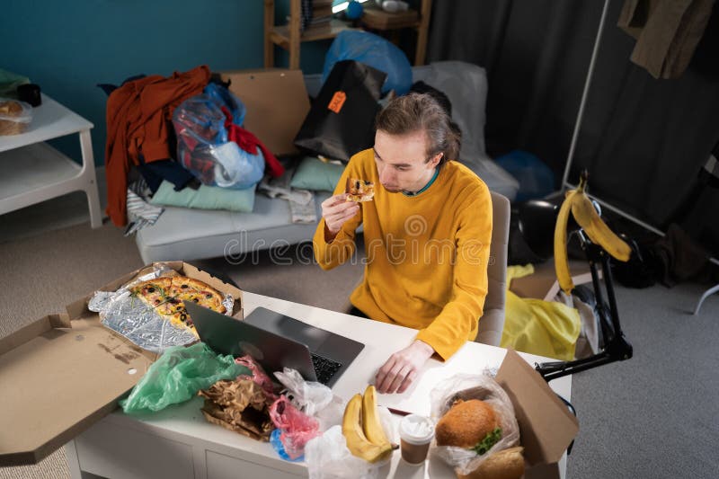 Student Studies at Home, Eats Pizza, Sits in a Messy Room, Works in a ...