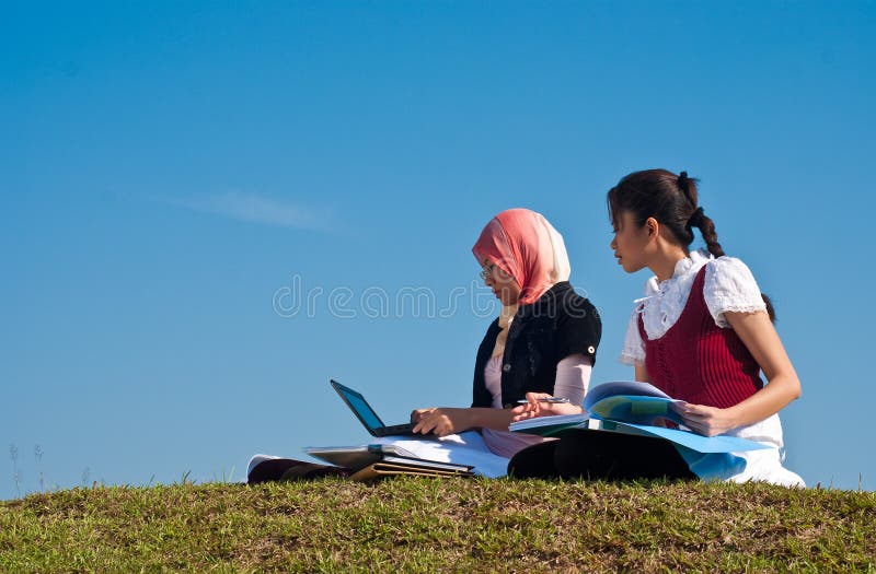 Student study with friend stock photo. Image of female - 13924612