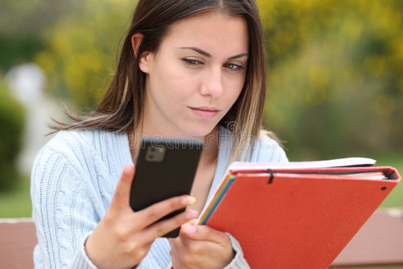 Student Studying and Checking Phone Stock Image - Image of learn ...