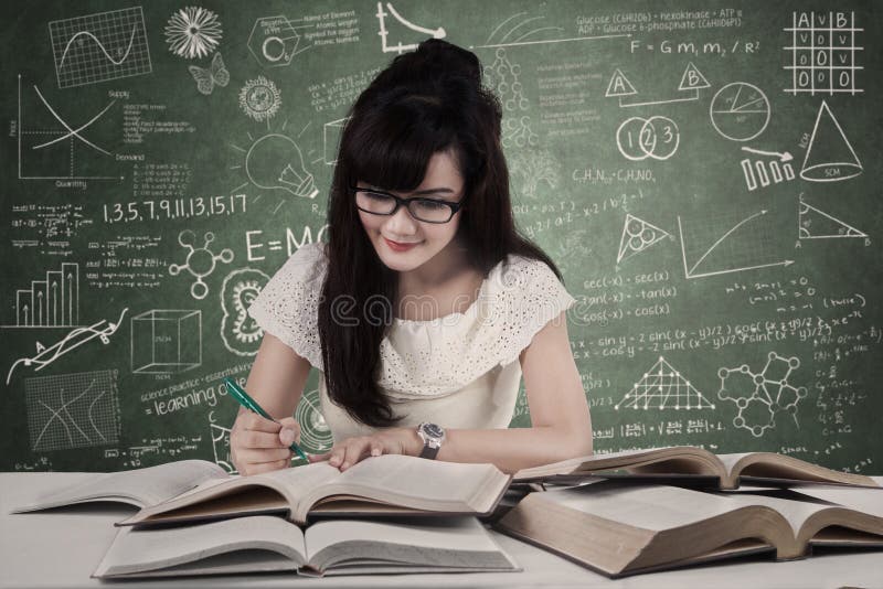 Student Studying at Classroom Stock Photo - Image of adult, college ...