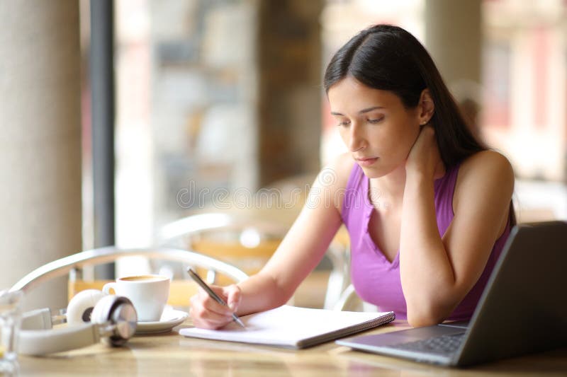 Student Studying in a Coffee Shop Reading Notes Stock Photo - Image of ...