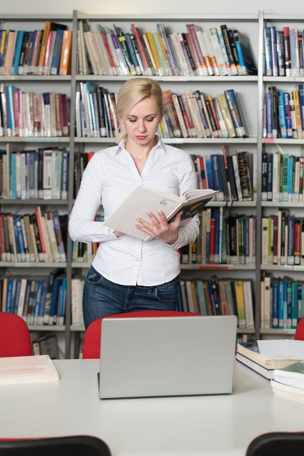 Student Studying at College Stock Photo - Image of indoor, learning ...