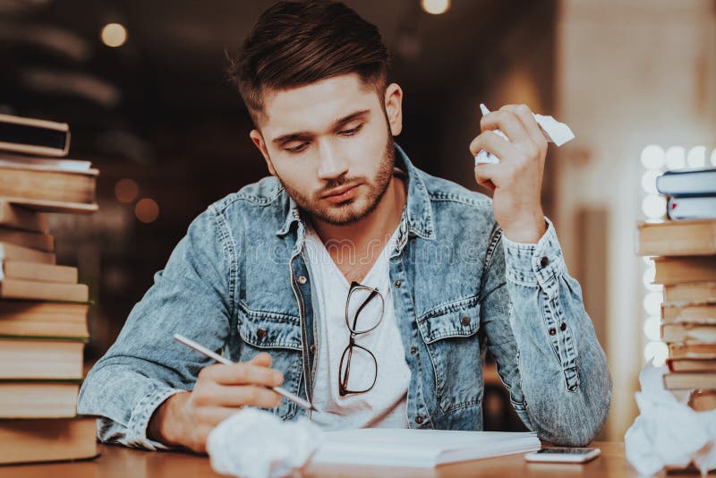 Student Studying at Desk in University Library Stock Photo - Image of ...