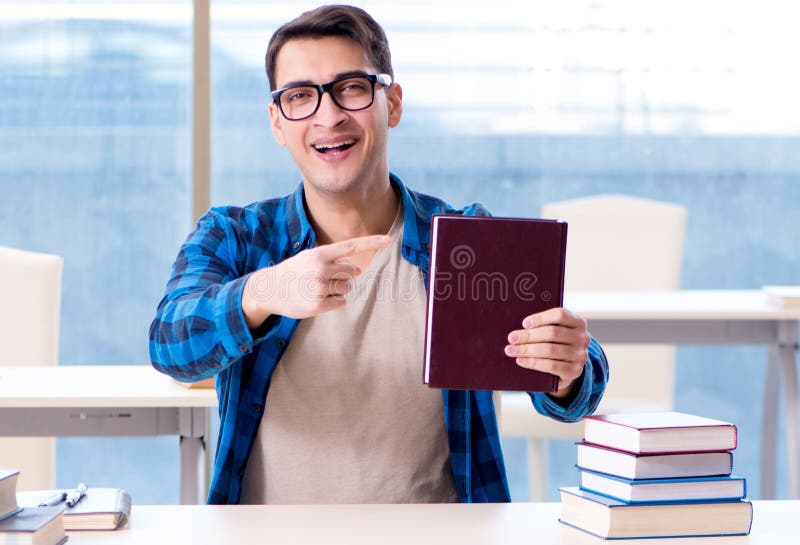 Student Studying in the Empty Library with Book Preparing for Ex Stock ...