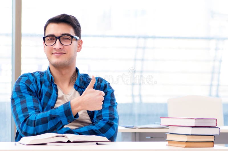 Student Studying in the Empty Library with Book Preparing for Ex Stock ...