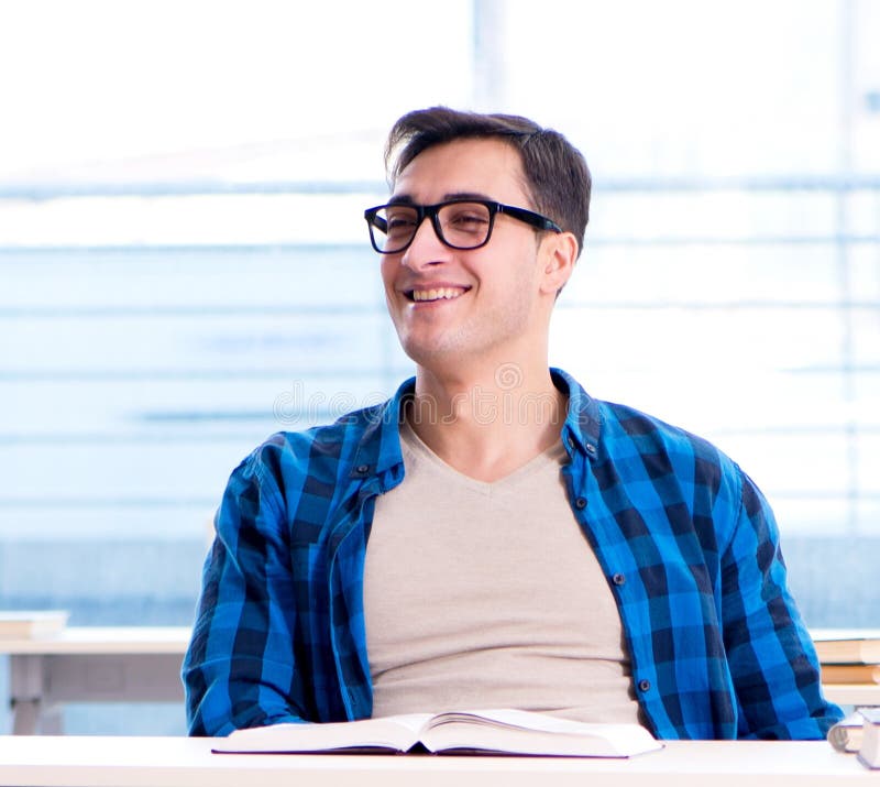 Student Studying in the Empty Library with Book Preparing for Ex Stock ...