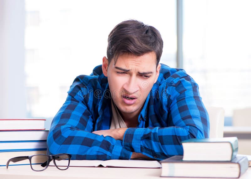 Student Studying in the Empty Library with Book Preparing for Ex Stock ...