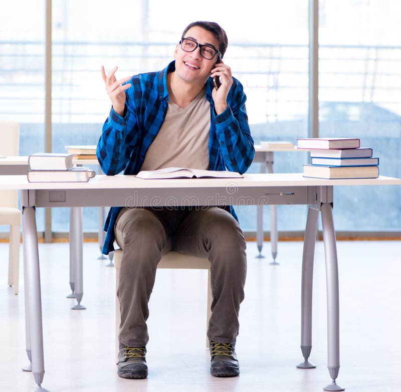 Student Studying in the Empty Library with Book Preparing for Ex Stock ...