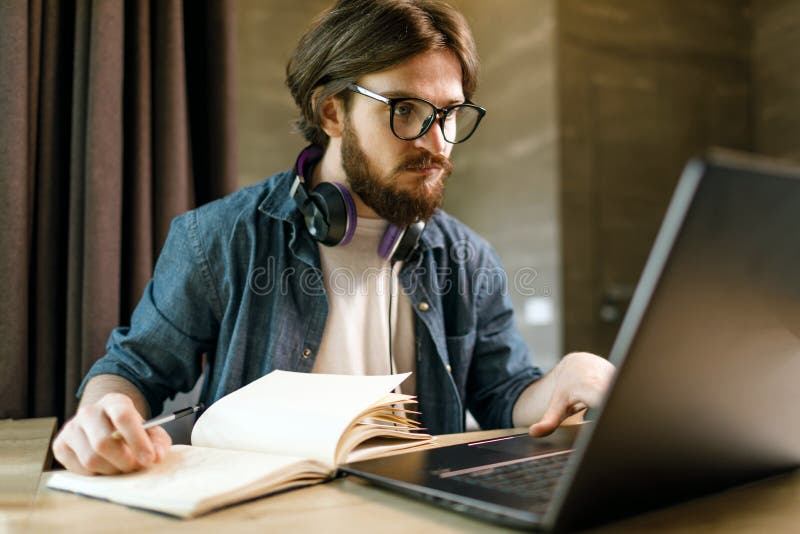 Student Studying with Laptop Stock Image - Image of headphones ...