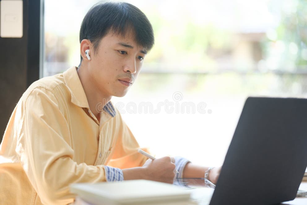 Student Studying Online and Preparing for Exams with Digital Devices ...