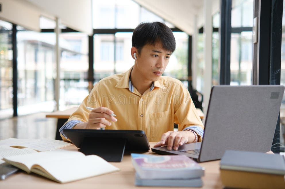 Student Studying Online and Preparing for Exams with Digital Devices ...