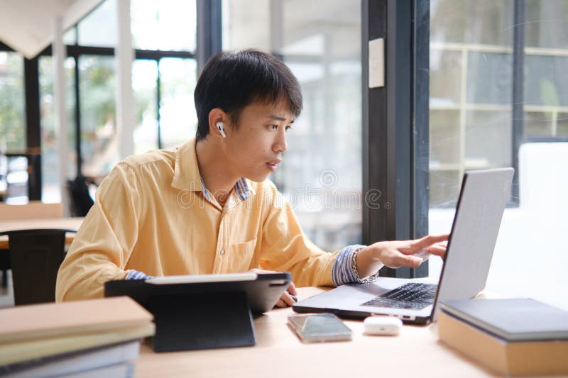 Student Studying Online and Preparing for Exams with Digital Devices ...