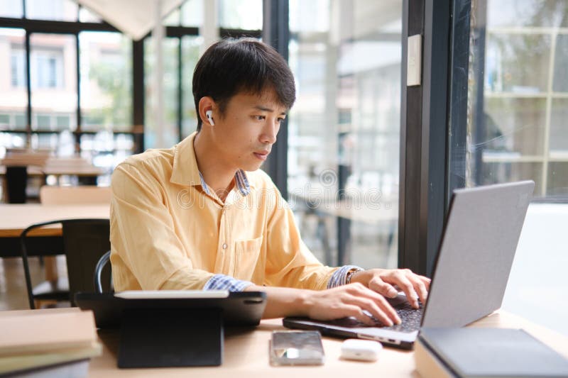 Student Studying Online and Preparing for Exams with Digital Devices ...