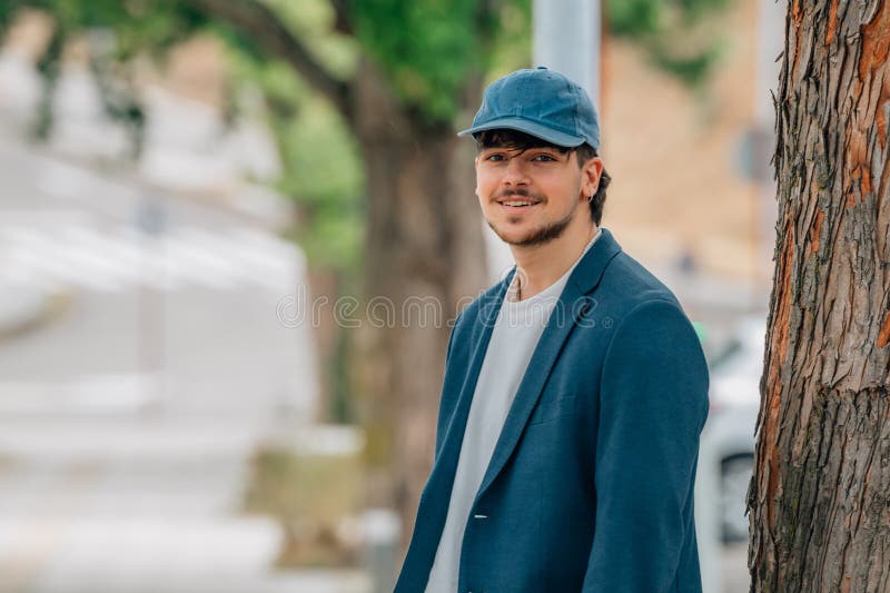 Student in a Suit and Cap on the Street Stock Photo - Image of blue ...
